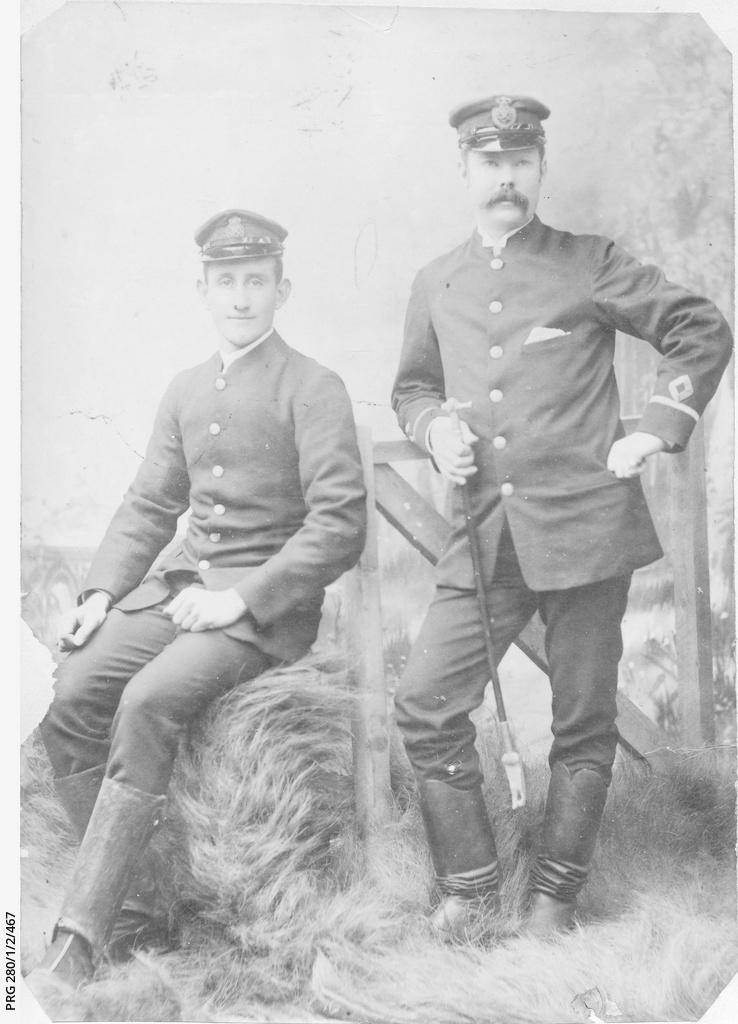 Studio view of W. Craigie and John Mears wearing their uniform as ...