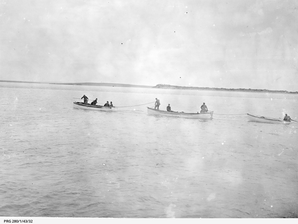 Men travelling in small craft at Laura Bay • Photograph • State Library ...