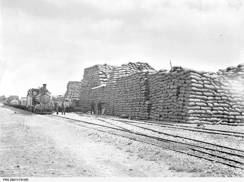 Wheat stack of bagged grain • Photograph • State Library of South Australia