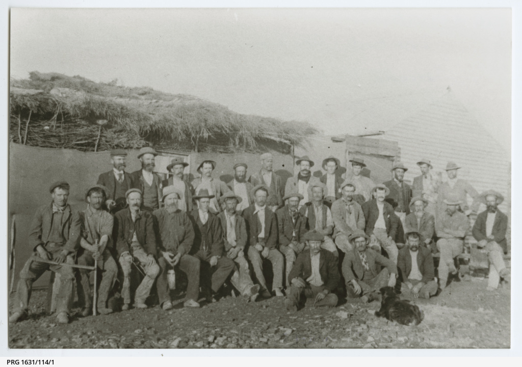 Group of men at the Tarcoola Gold Mine • Photograph • State Library of ...