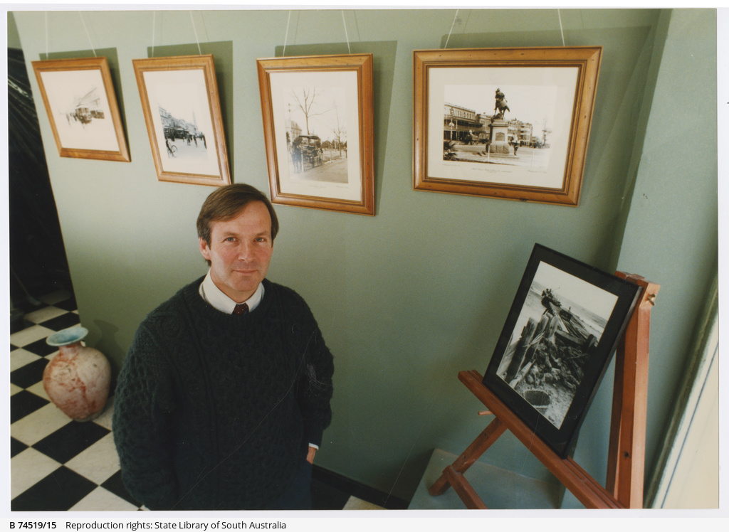 Jerry Elder with a display of Ernest Fidge photographs • Photograph • State Library of South ...