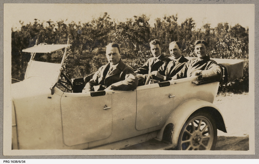 Four men in a car • Photograph • State Library of South Australia