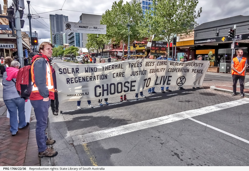 Extinction Rebellion banner being held across Gouger Street for the ...
