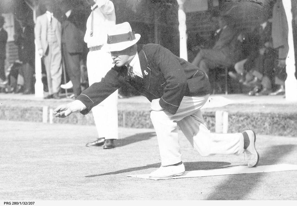 A lawn bowler in action • Photograph • State Library of South Australia