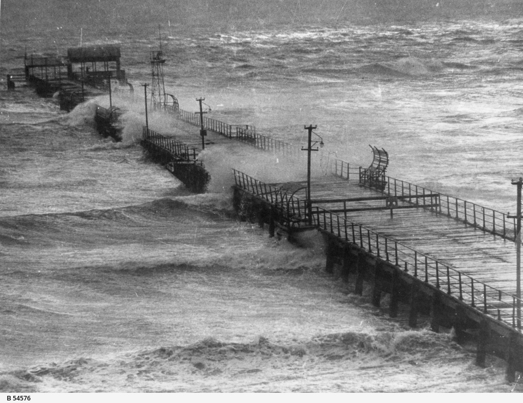 Largs jetty during a storm • Photograph • State Library of South Australia