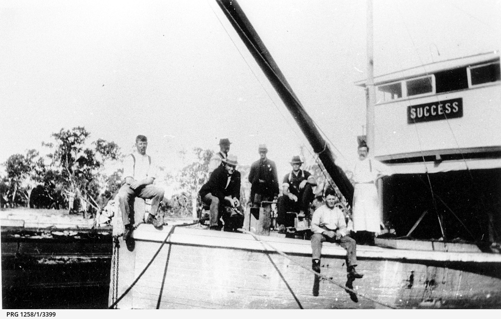 Crew of P.S. Success sitting and standing around the bow • Photograph ...