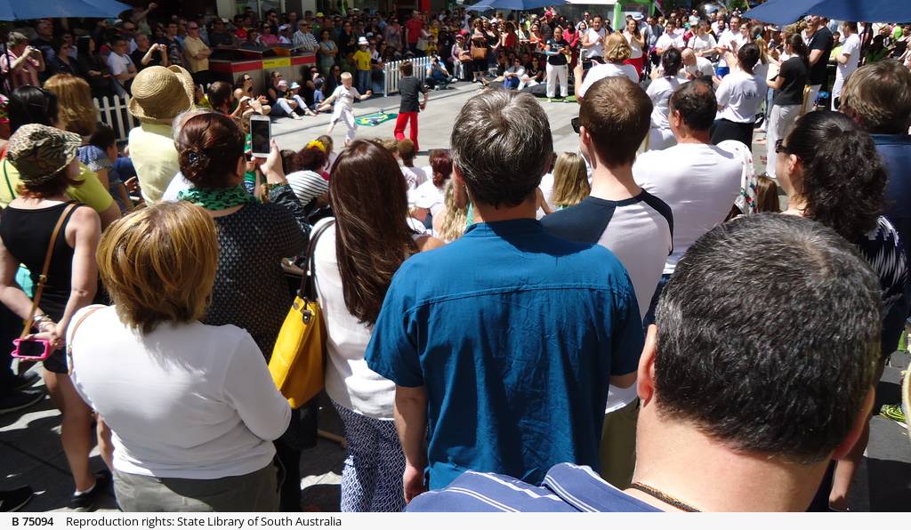 Crowd watching two young performers • Photograph • State Library of ...