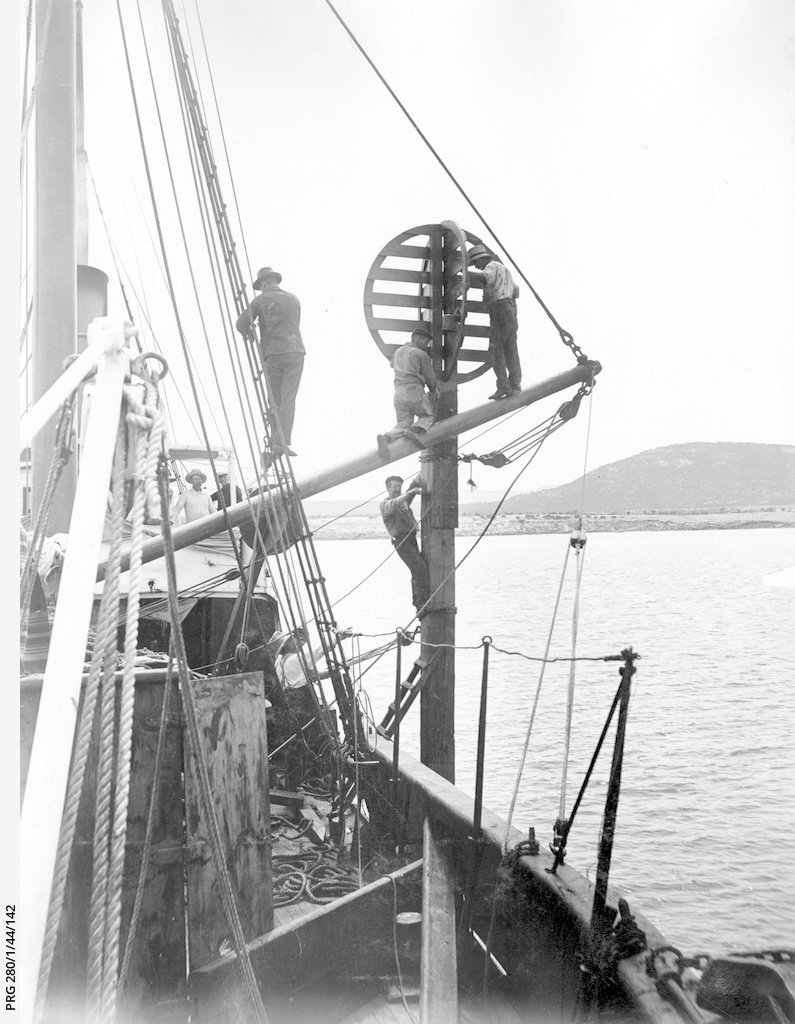 Placing a beacon at sea • Photograph • State Library of South Australia
