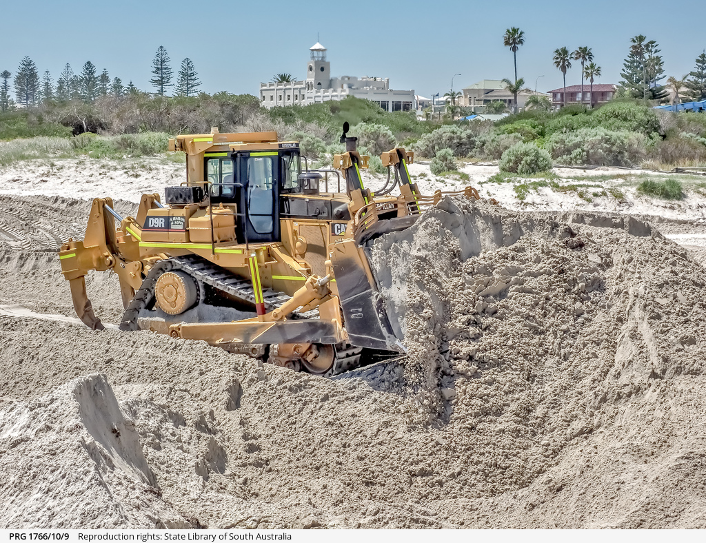 Dozer pushing sand at Semaphore Beach • Photograph • State Library of ...