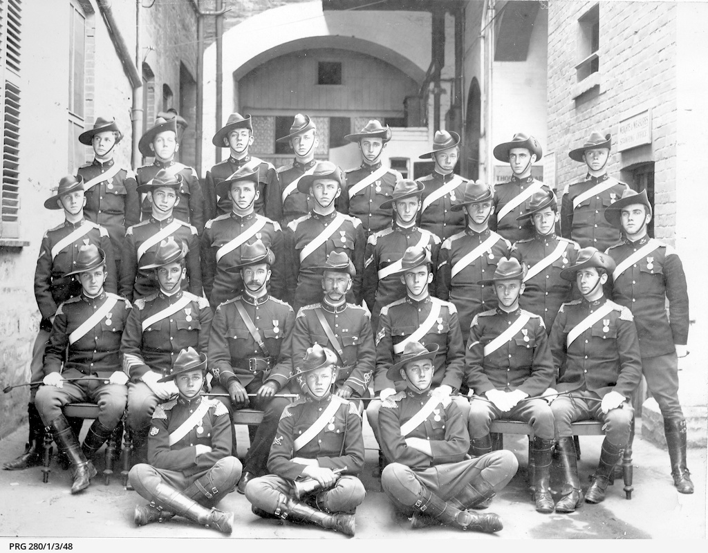 A formal group of young men in army uniform described as the 1st ...