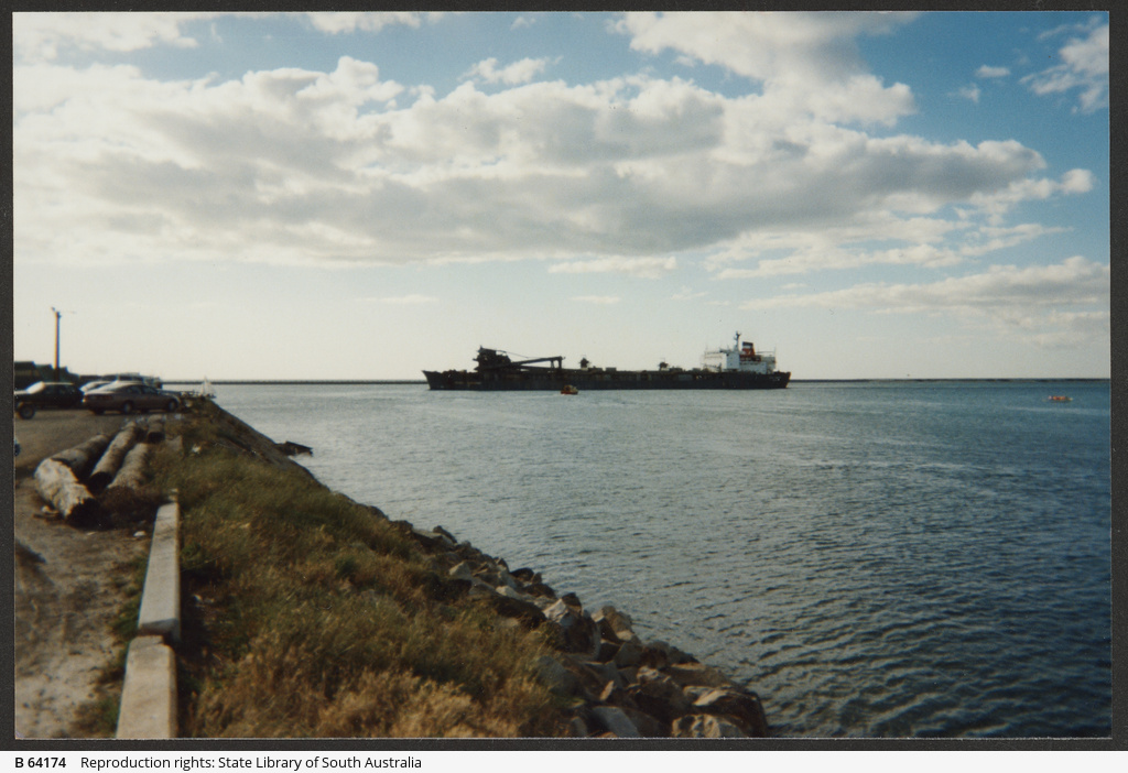 A cargo ship leaving Outer Harbor • Photograph • State Library of South ...