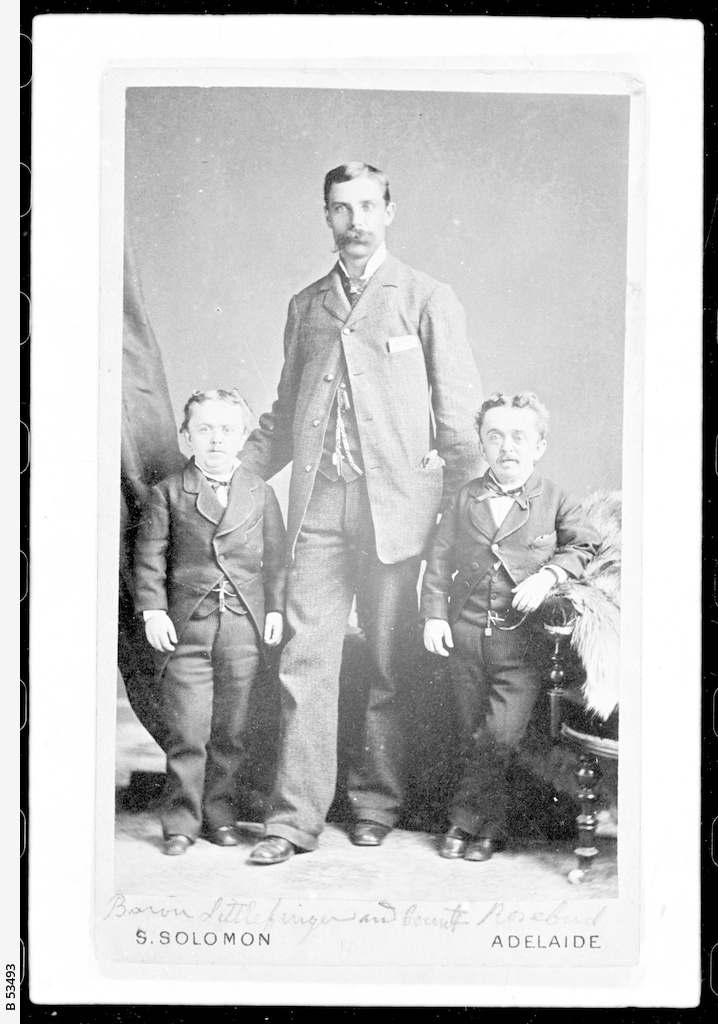 Two little people with a taller man • Photograph • State Library of ...