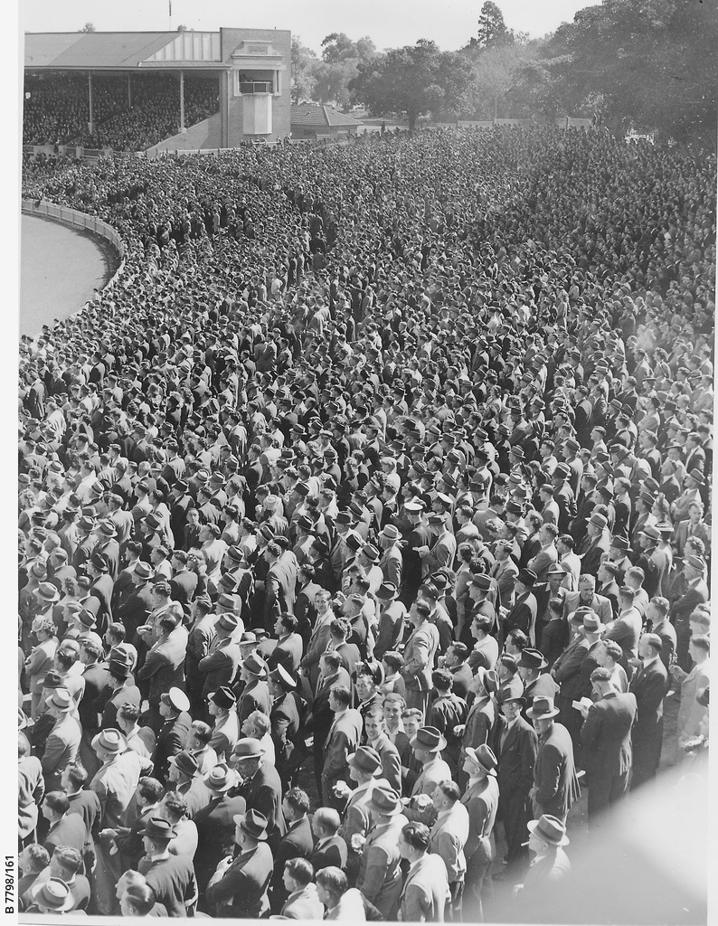 Crowd at a football match • Photograph • State Library of South Australia